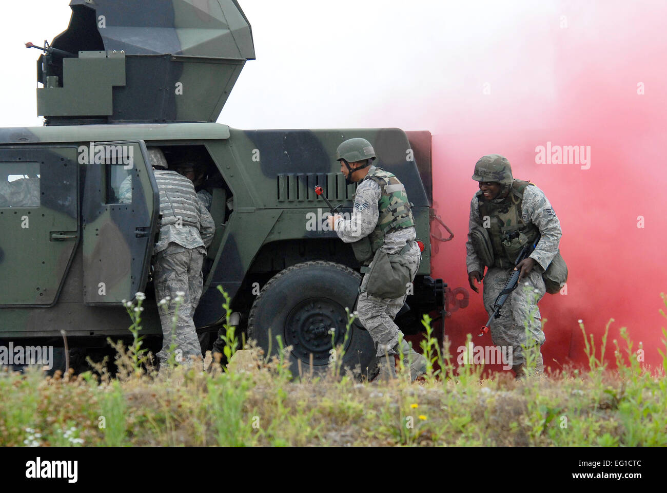 Airmen prepare to enter a functional humvee after the one they were ...