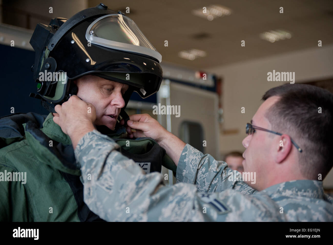 Lt. Gen. Frank Gorenc, 3rd Air Force commander right, gets strapped ...
