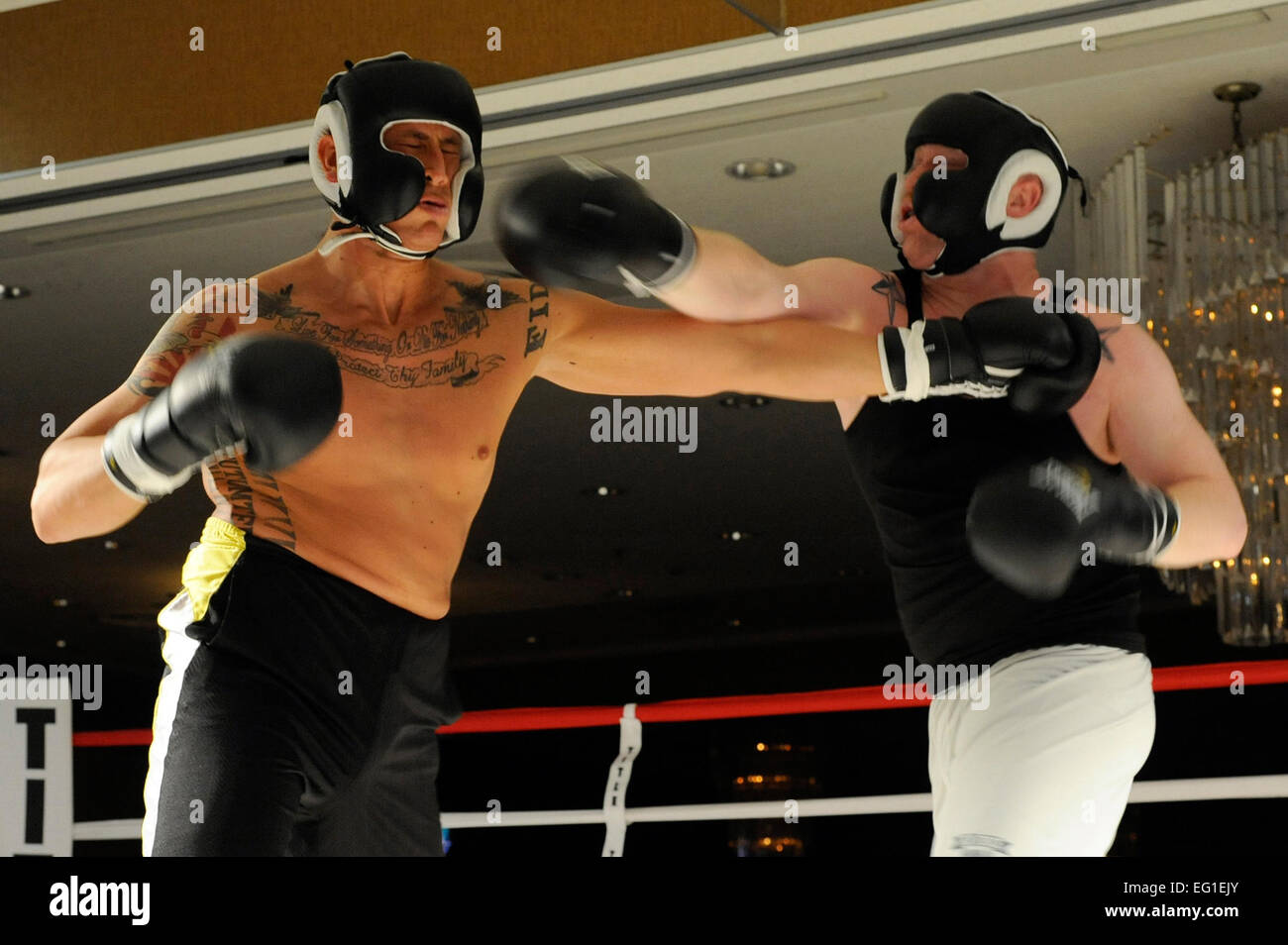 Joshua Formanek left and Jordan Outzen throw punches during “Friday ...