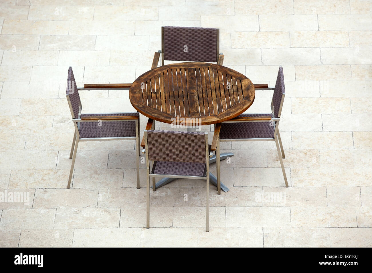 Outdoor summer cafe tables with chairs. View from above. Copy space ...
