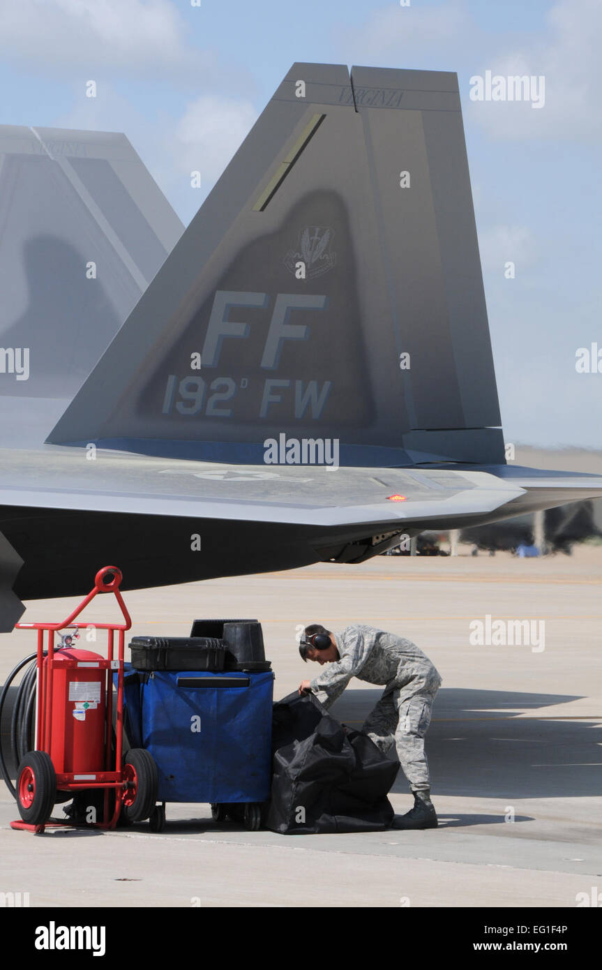 U.S. Air Force Senior Airman Adam Hamel prepares to perform maintenance ...