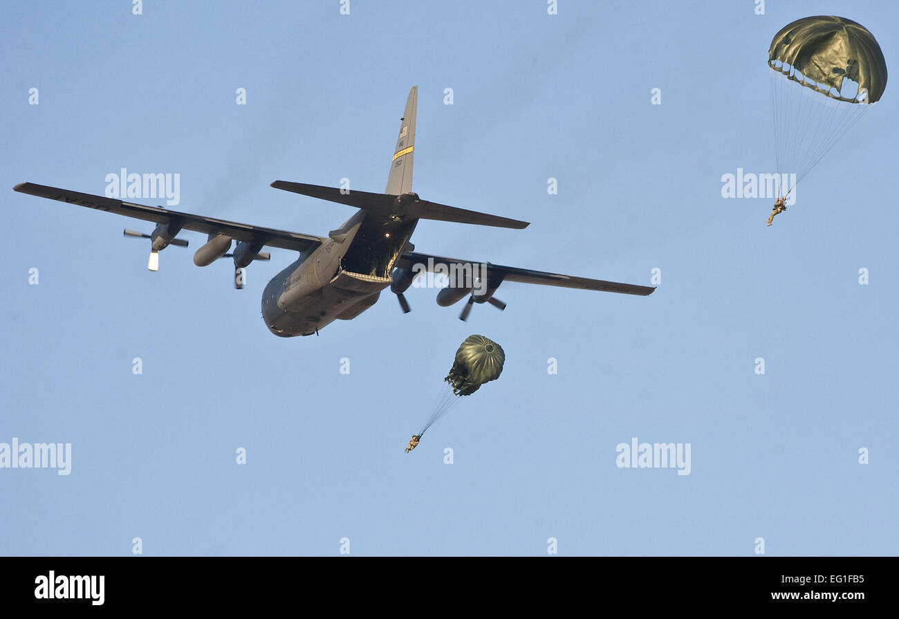 Airmen from the 820th RED HORSE Squadron’s airborne flight drop from a ...