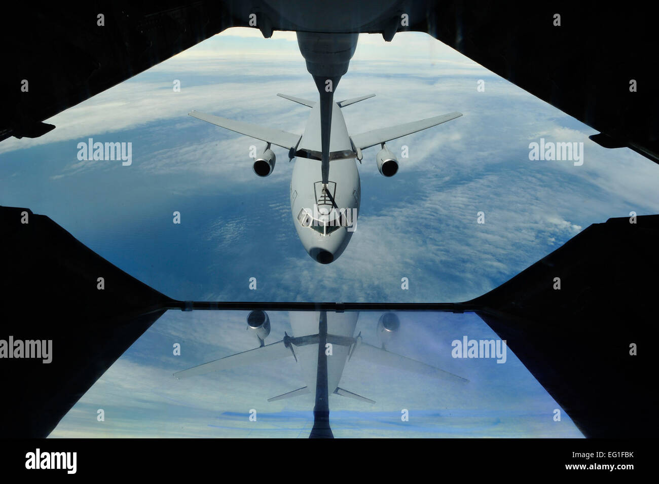 A U.S. Air Force KC-10 Extender aerial refueling aircraft refuels ...