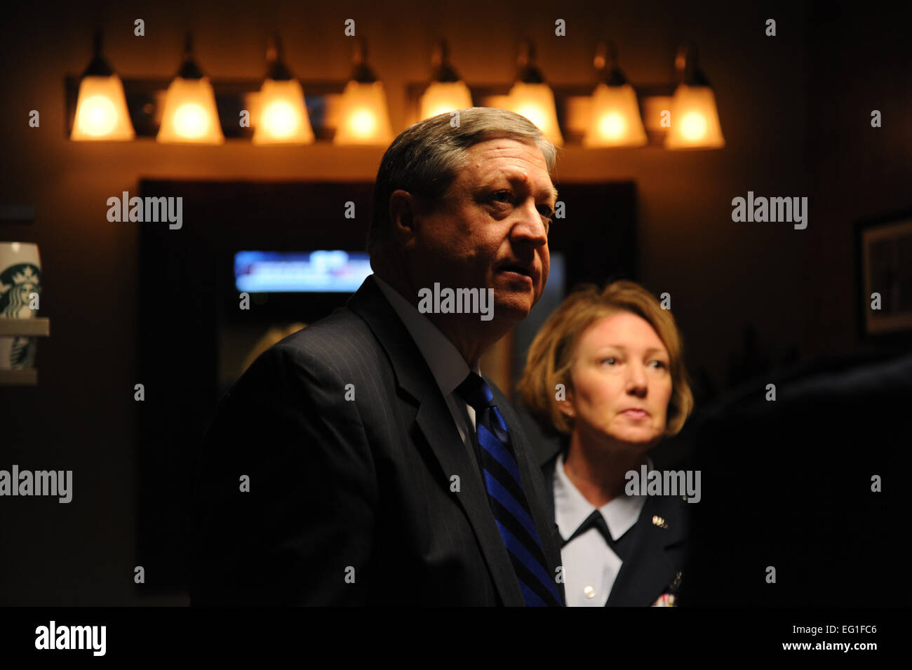 Secretary of the Air Force Michael Donley watches a live stream of ...