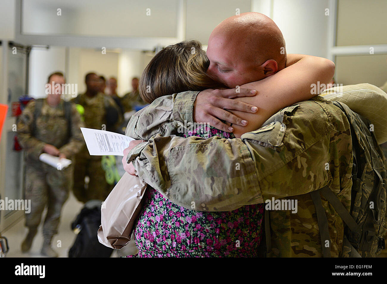 Senior Airman Mark Delaney, 748th Aircraft Maintenance Squadron, greets ...
