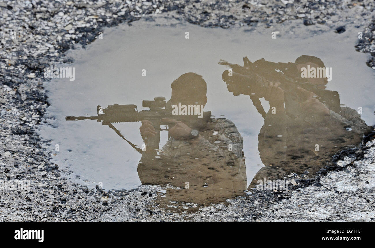 Senior Airman Adrian Alvarez and Airman 1st Class Steven Adler, 509th ...