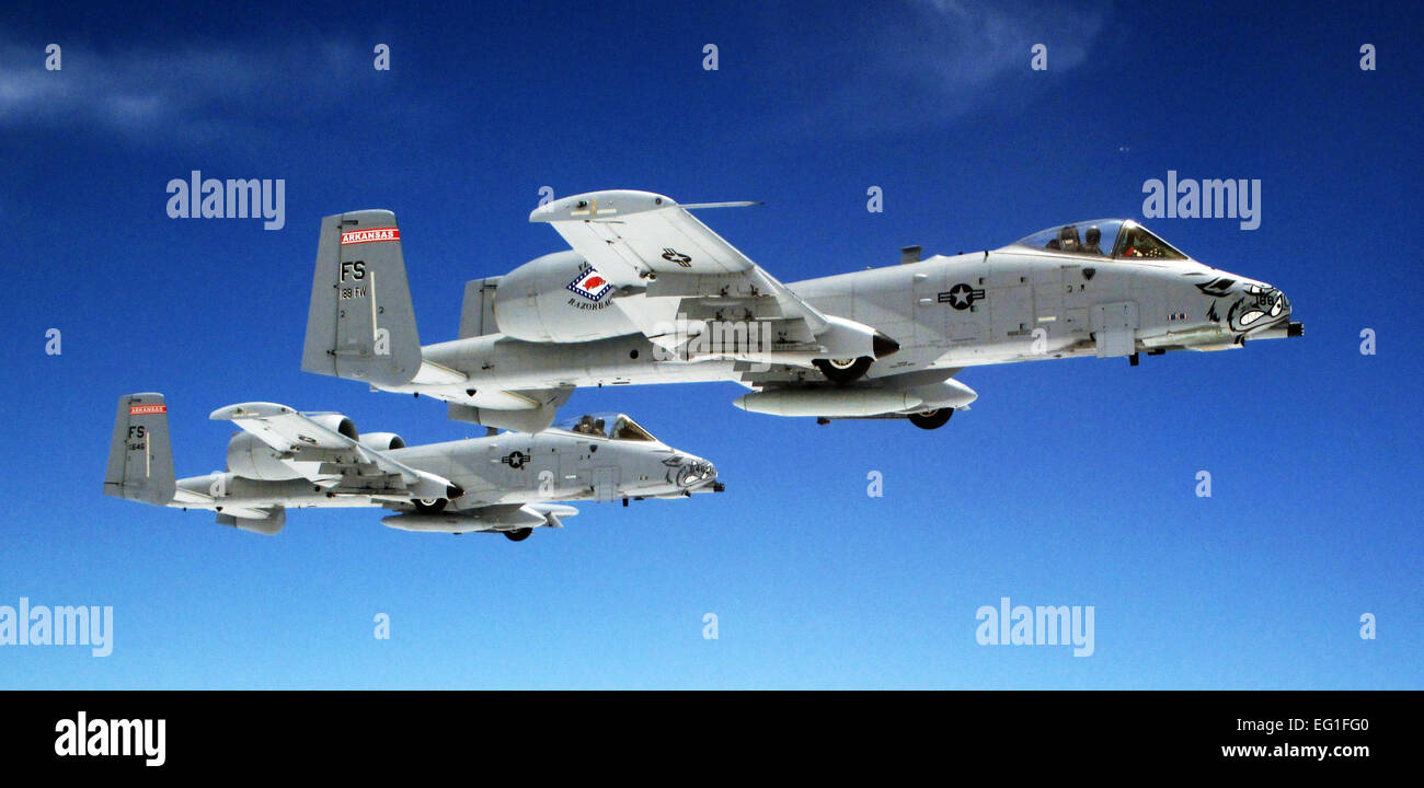 A pair of Air Force A-10 Thunderbolt II aircraft fly in formation June ...
