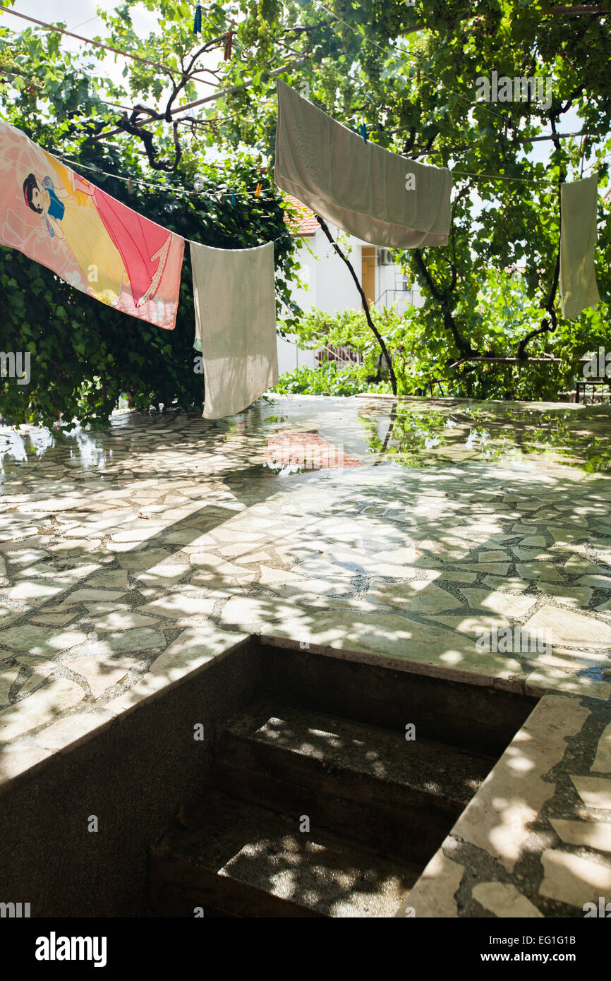 Sun drying washings Stock Photo - Alamy