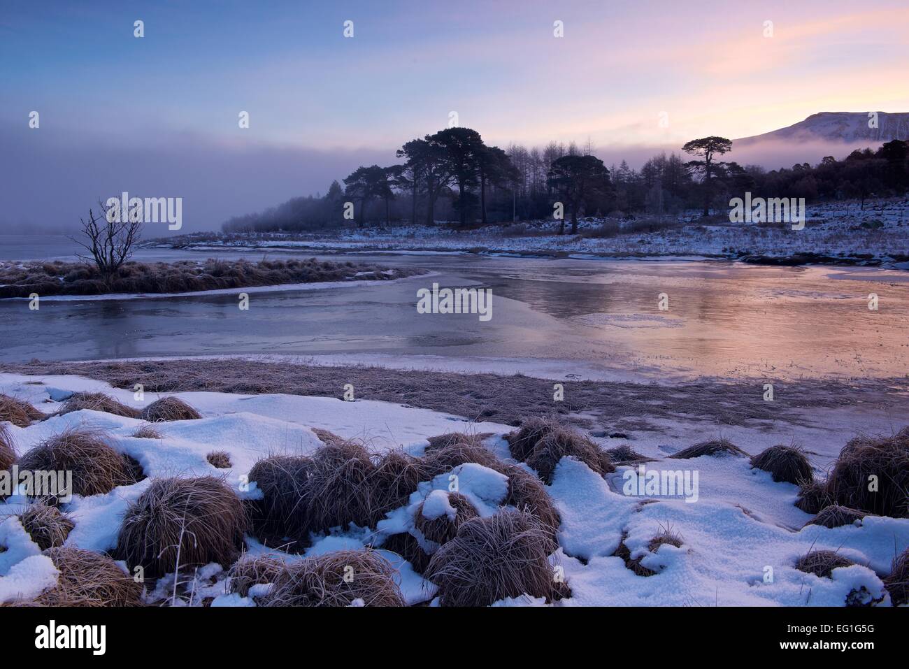 A colourful sunrise taken from the banks of Loch Tulla Stock Photo - Alamy