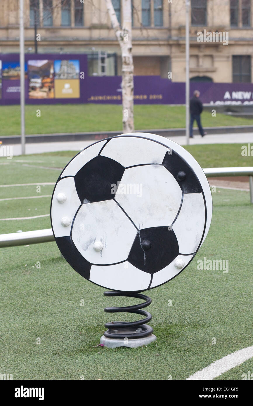 Football spring rider Outdoor Playground Equipment Stock Photo - Alamy