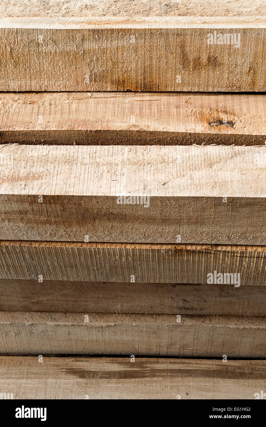 Lumber stacked at construction site Stock Photo - Alamy