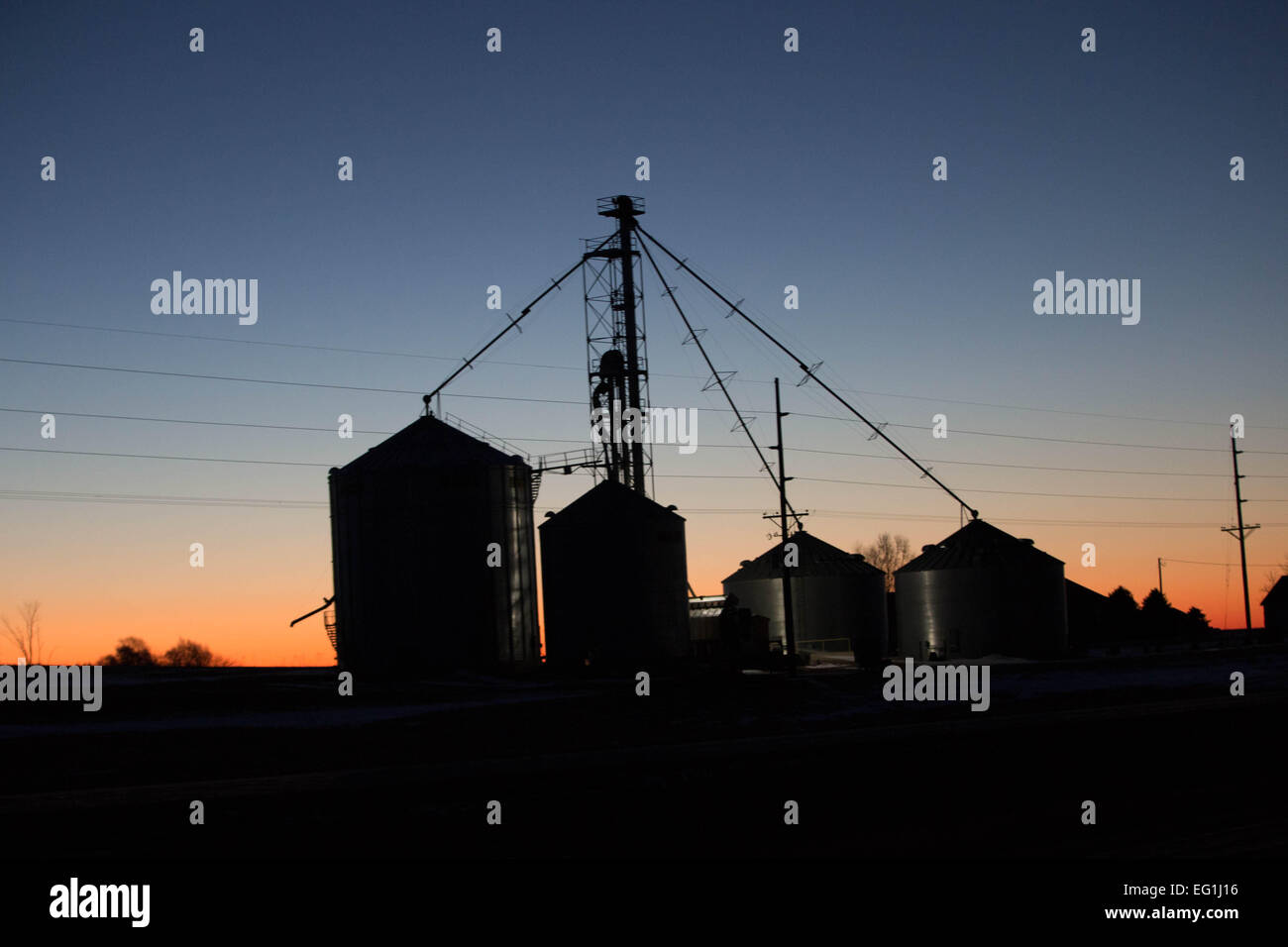 Grain elevator at sunset Stock Photo - Alamy