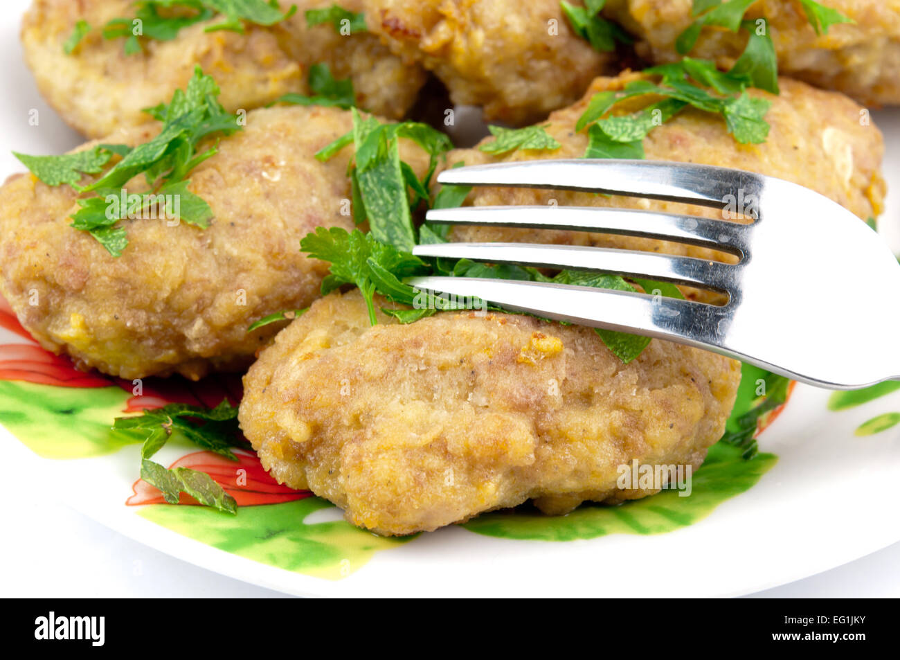 chops on a dish are isolated on white Stock Photo - Alamy