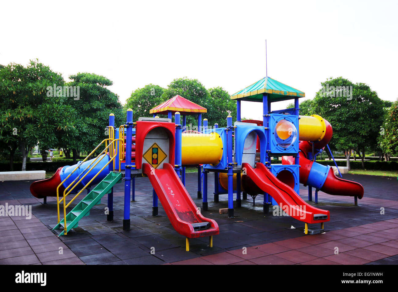 Colorful children playground in the park Stock Photo - Alamy