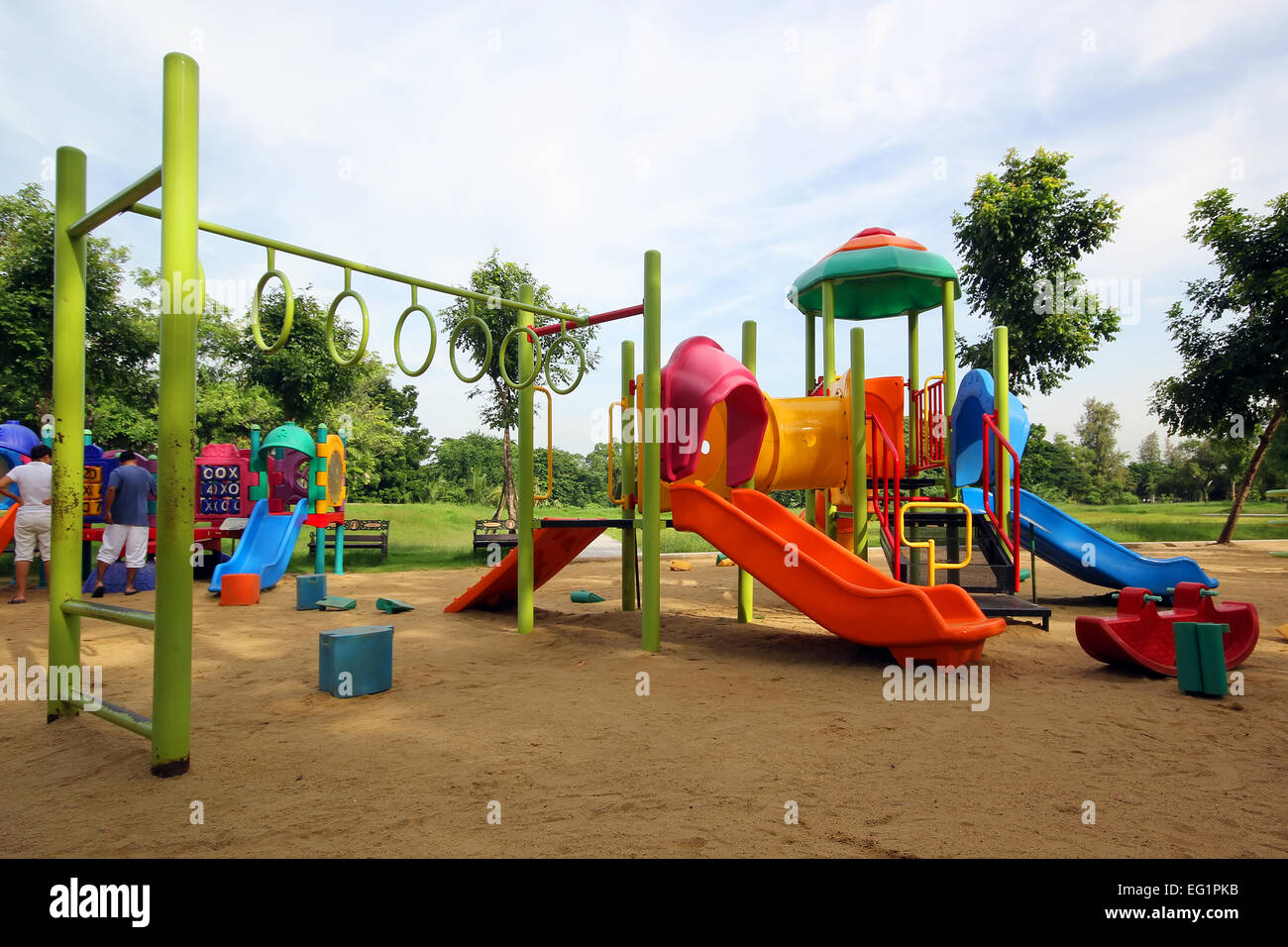 Colorful children playground in the park Stock Photo - Alamy