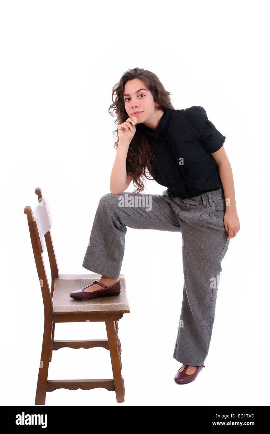 Young girl posing, isolated over white background Stock Photo - Alamy