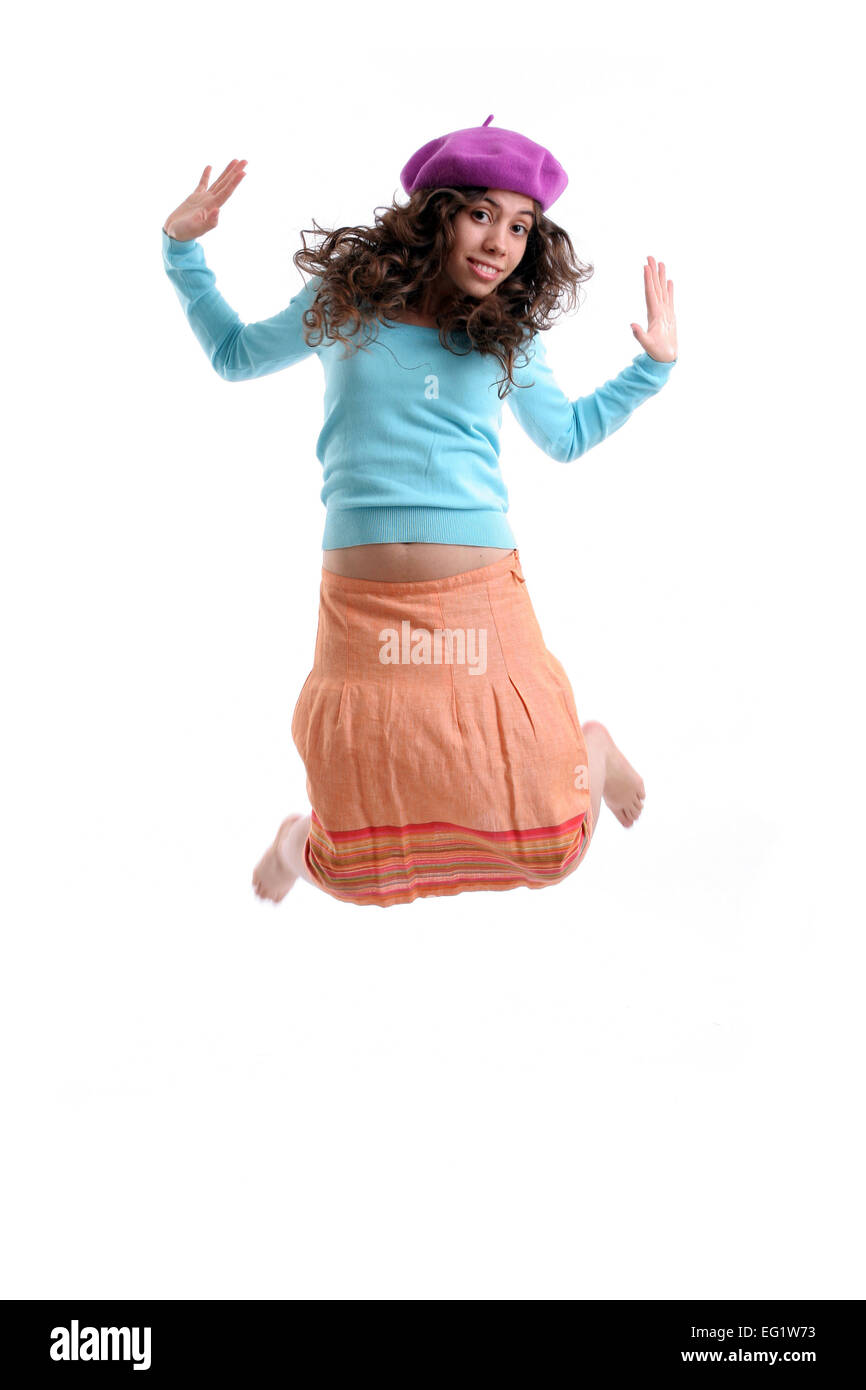 Young woman jumping, isolated in white background - image full of ...