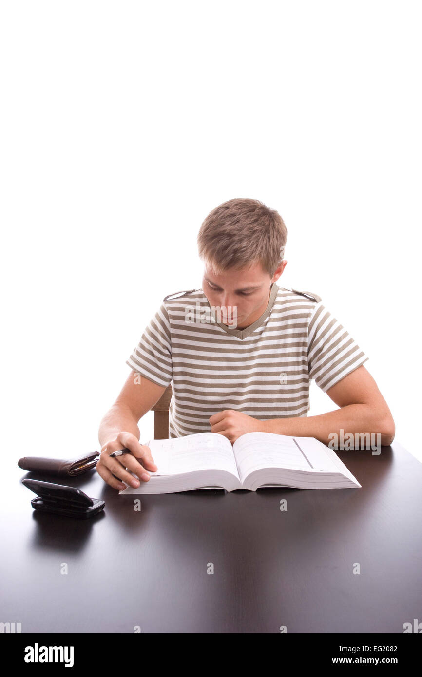 Young boy studying, isolated over white background Stock Photo - Alamy
