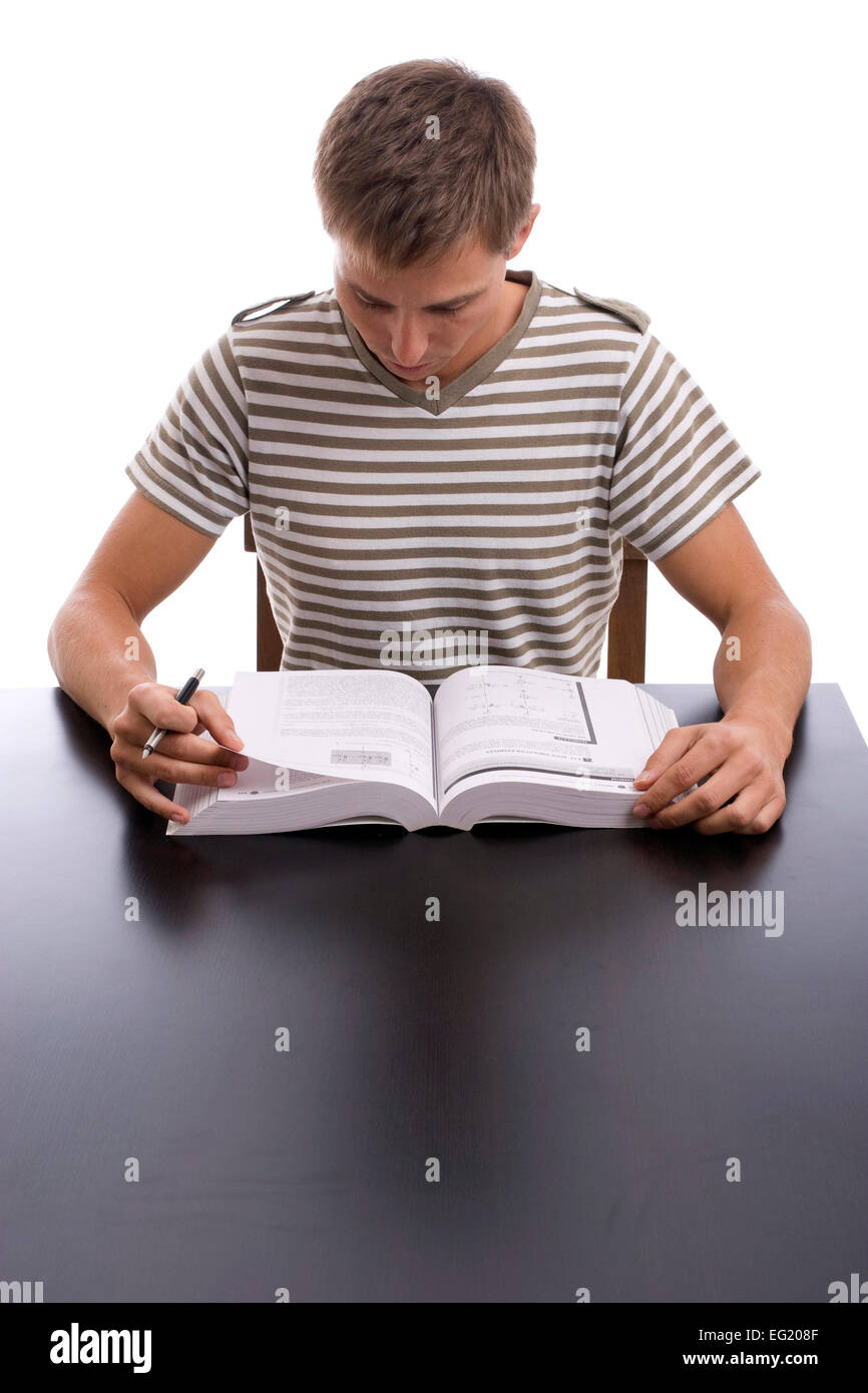 Young boy studying, isolated over white background Stock Photo - Alamy