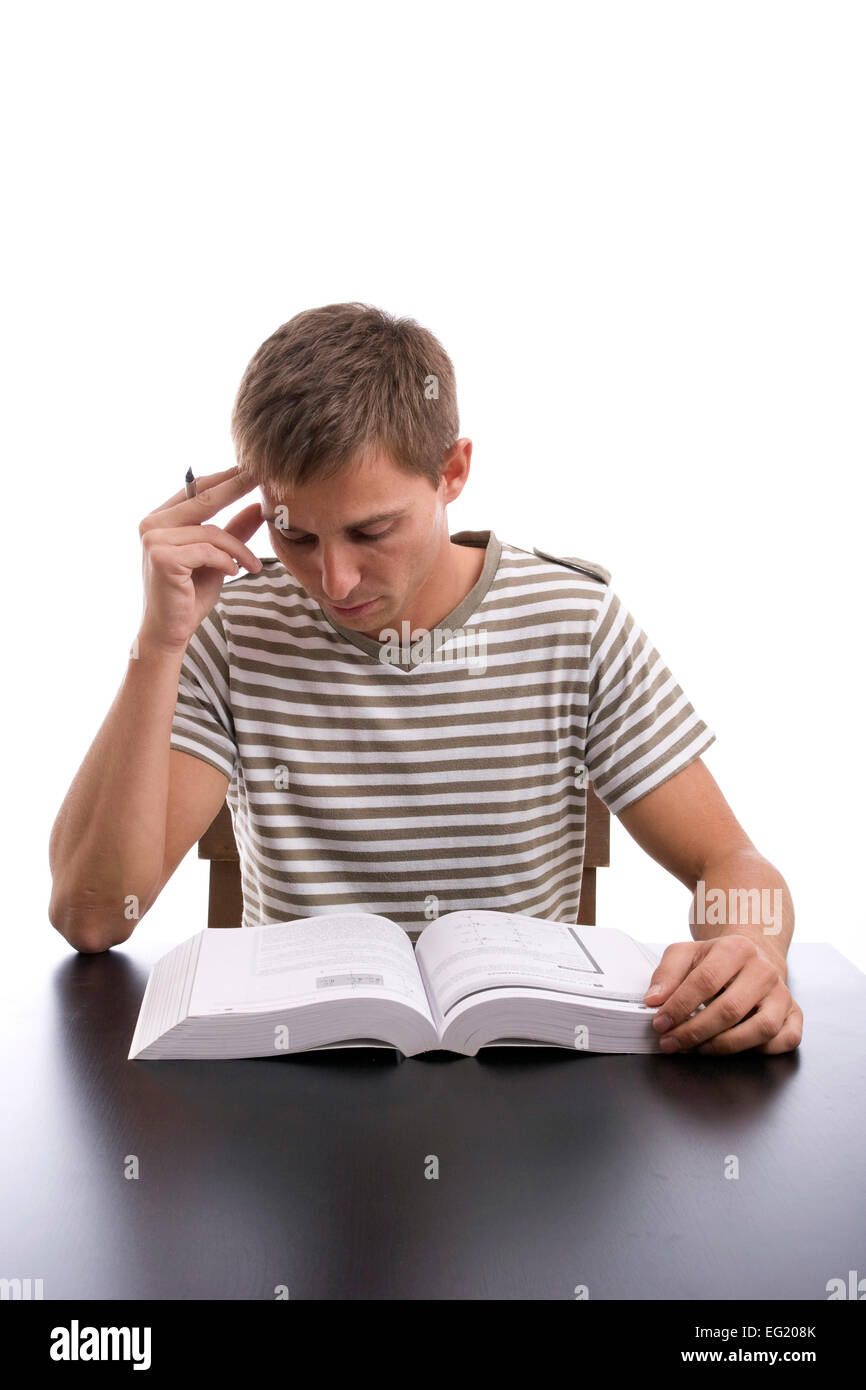 Young boy studying, isolated over white background Stock Photo - Alamy