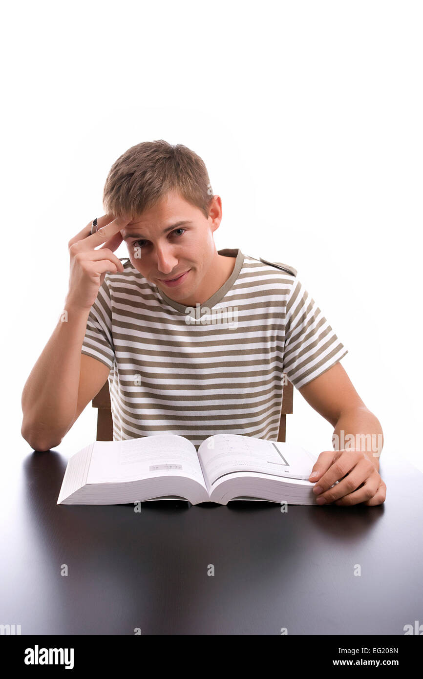 Young boy studying, isolated over white background Stock Photo - Alamy
