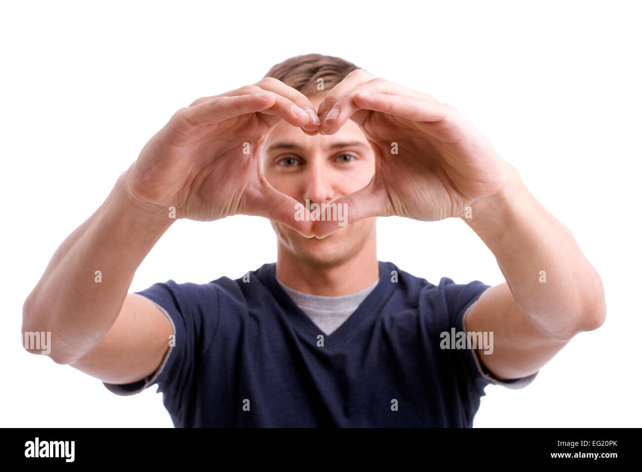 Young Man Drawing Heart with Hands - focus on hands Stock Photo - Alamy