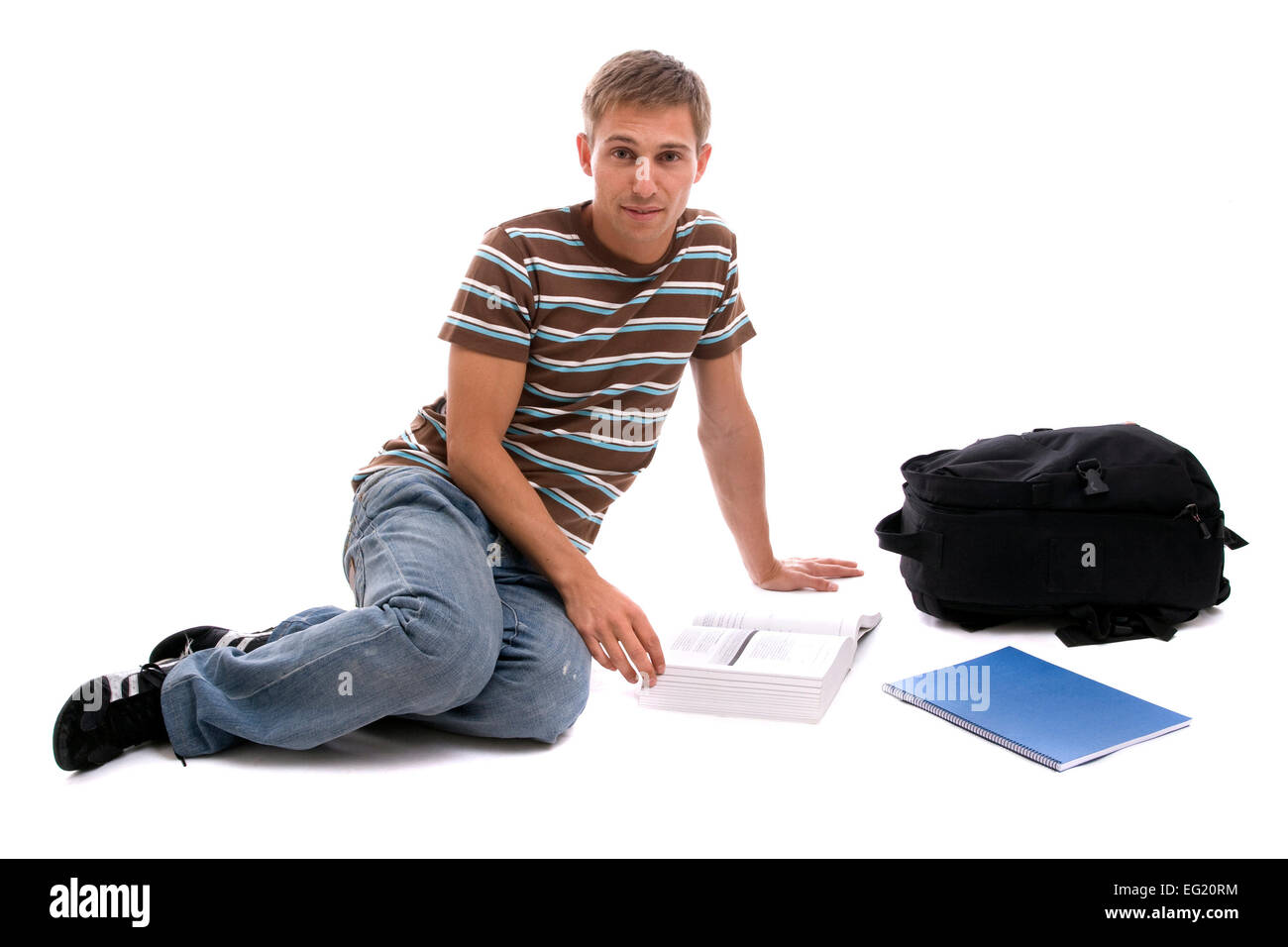 Young man studying, isolated over white background Stock Photo - Alamy