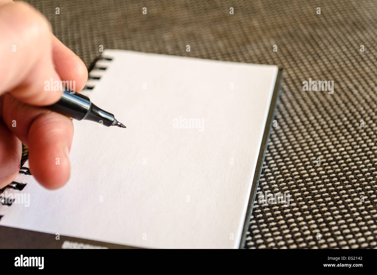 White notepad and ink pen Stock Photo - Alamy
