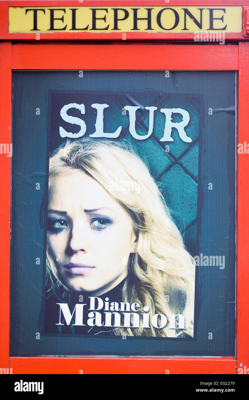 Vintage red phone box advertising hi-res stock photography and images ...