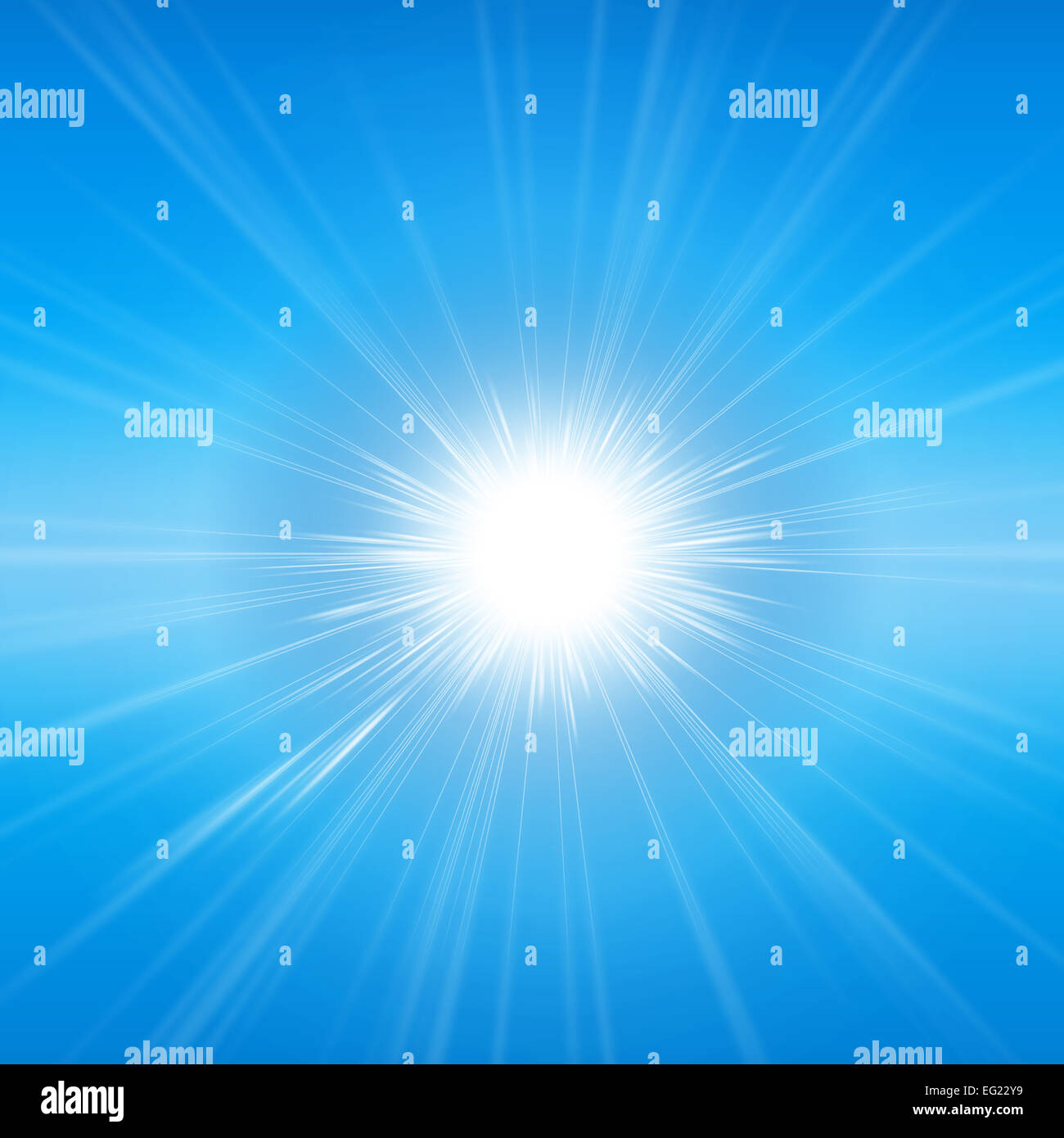 Radiant sunshine. Intense sunlight and sunbeams in a clear blue sky ...