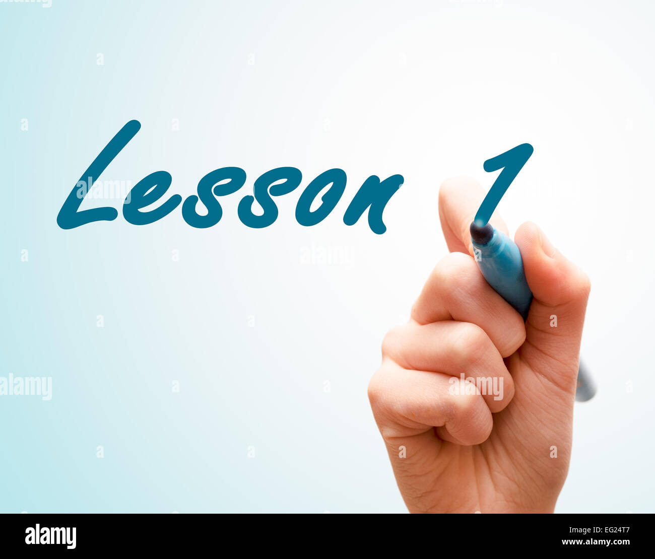 Hands with pen writing on screen lesson 1 Stock Photo - Alamy