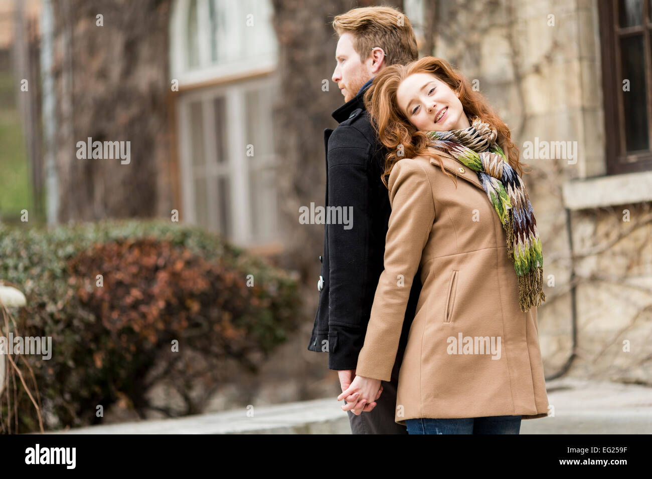 Young red hair couple at autumn park Stock Photo - Alamy