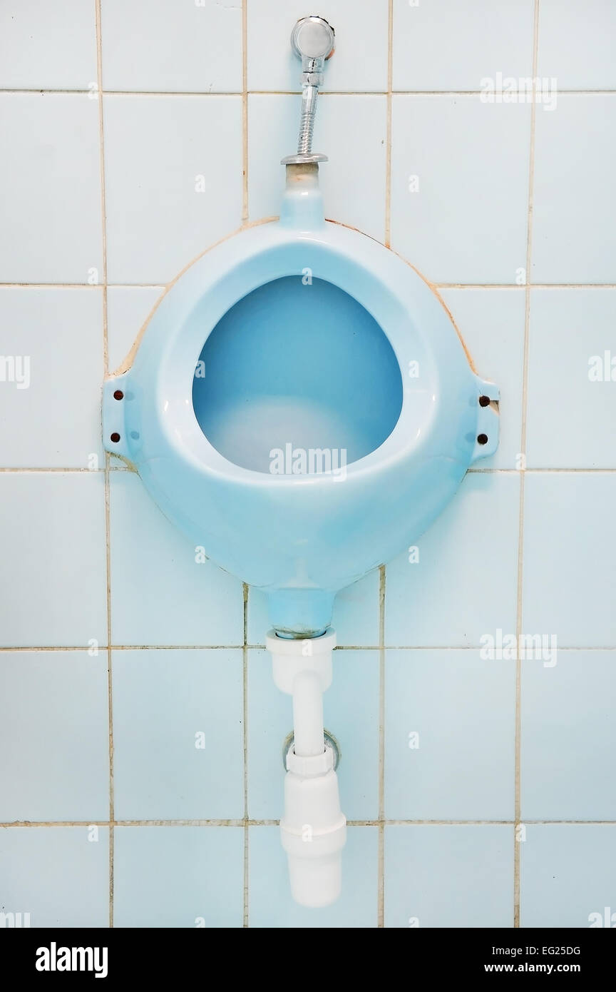 Detail with one blue urinal in a public men's toilet Stock Photo - Alamy