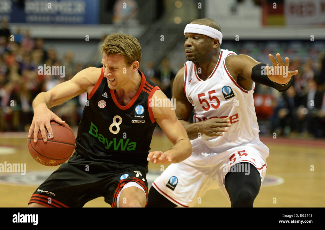Munich, Germany. 11th Feb, 2015. Munich's Heiko Schaffartzik (L) and ...