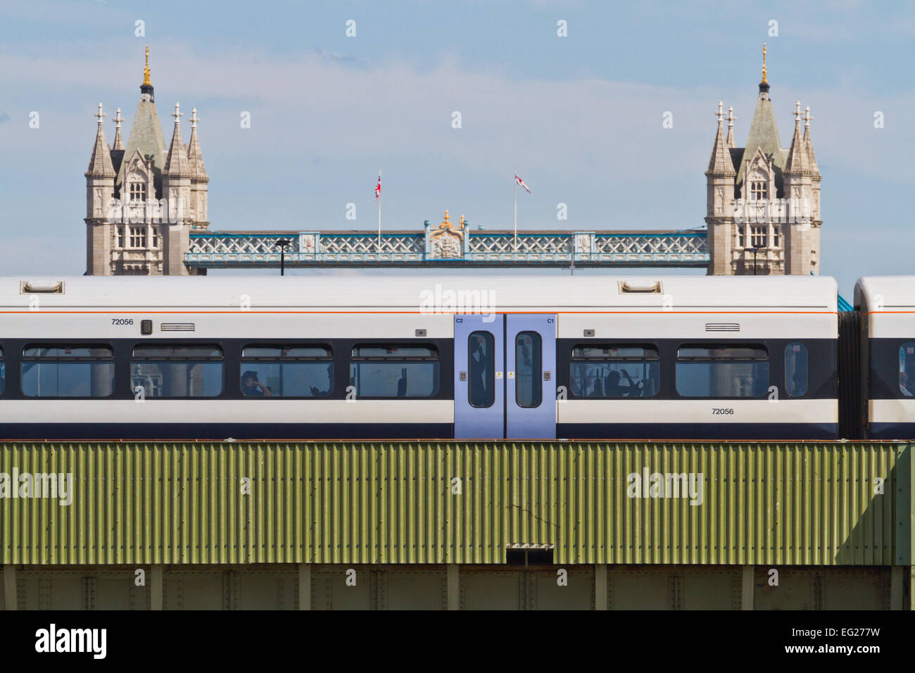 Railway carriages approach Cannon Street Station with Tower Bridge ...