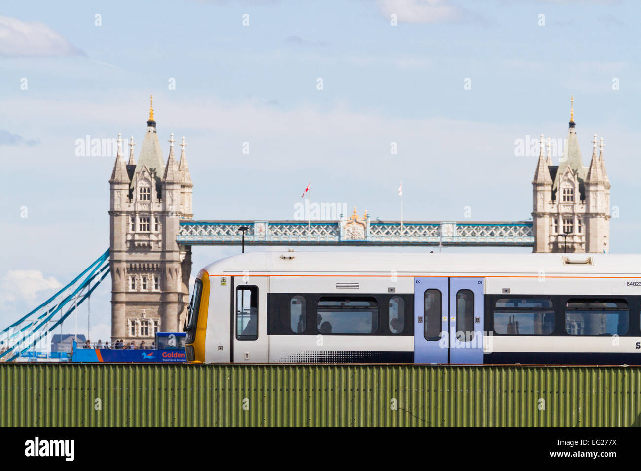 Railway carriages approach London Cannon Street Station with Tower ...