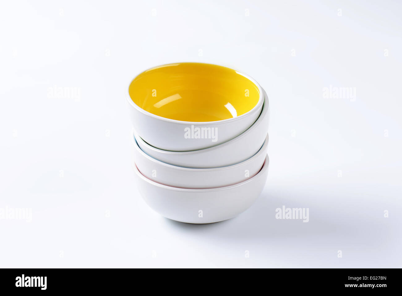 Stack of round two tone bowls Stock Photo - Alamy