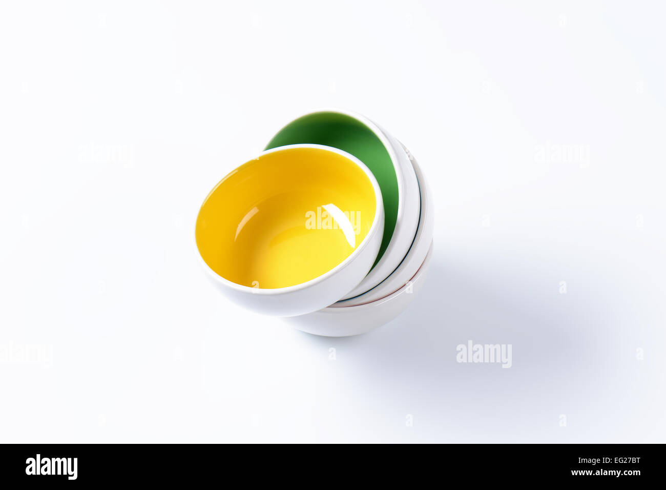 Stack of round two tone bowls Stock Photo - Alamy