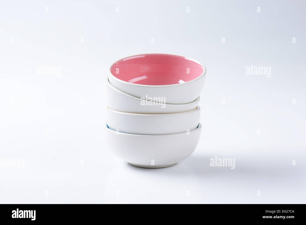 Stack of round two tone bowls Stock Photo - Alamy