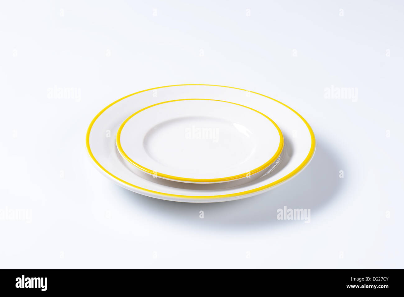Yellow plates hi-res stock photography and images - Alamy