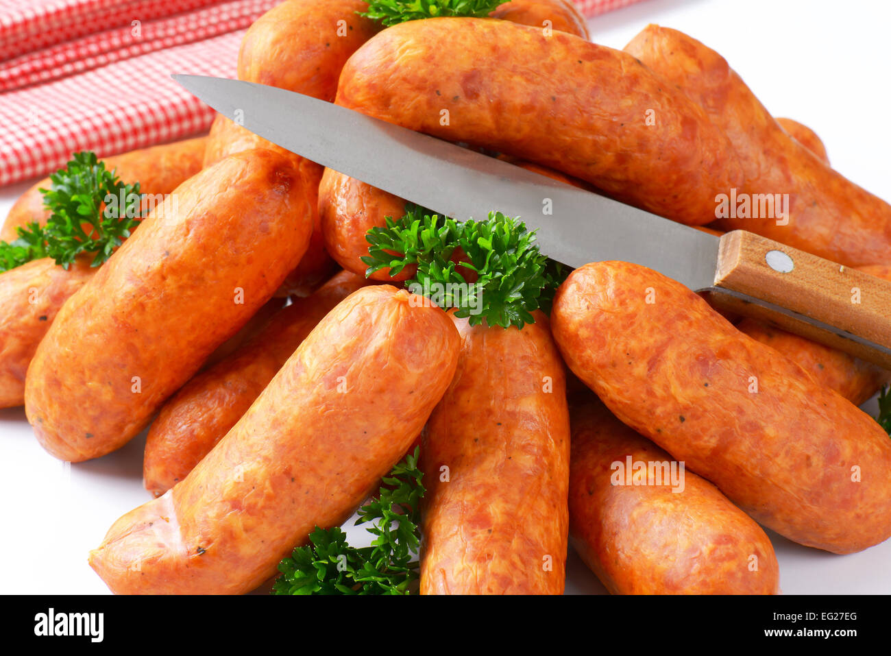 Short pork sausages in natural casings Stock Photo - Alamy
