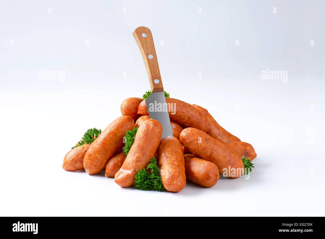 Short pork sausages in natural casings Stock Photo - Alamy