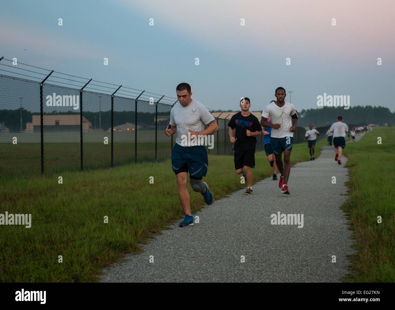 Runners make their way down a running trail during an Air Force ...
