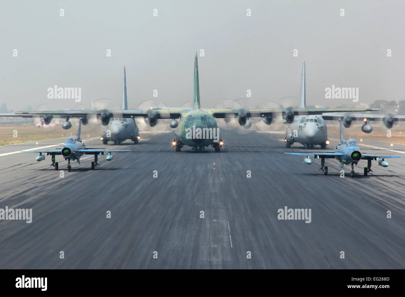 Two Bangladesh Air Force BAF F-7BG Defenders, a BAF C-130B Hercules ...