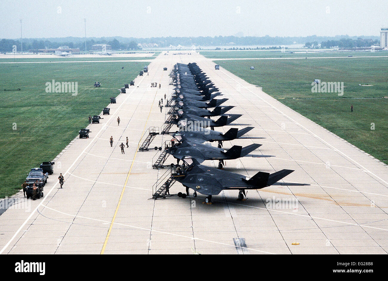 Ground crews service the F-117A aircraft of the 37th Tactical Fighter ...