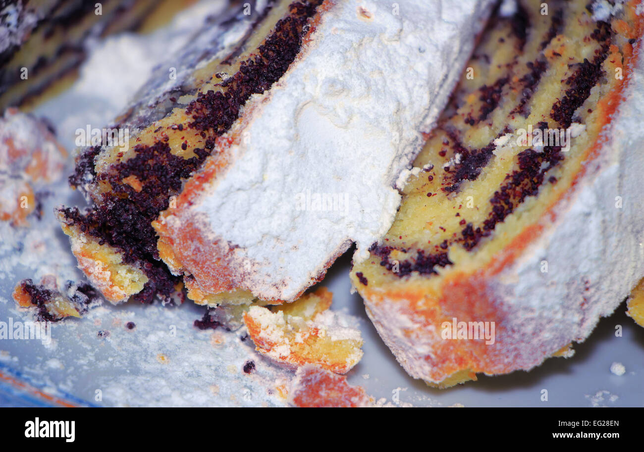 Layer cake poppy seeds with powder Stock Photo - Alamy
