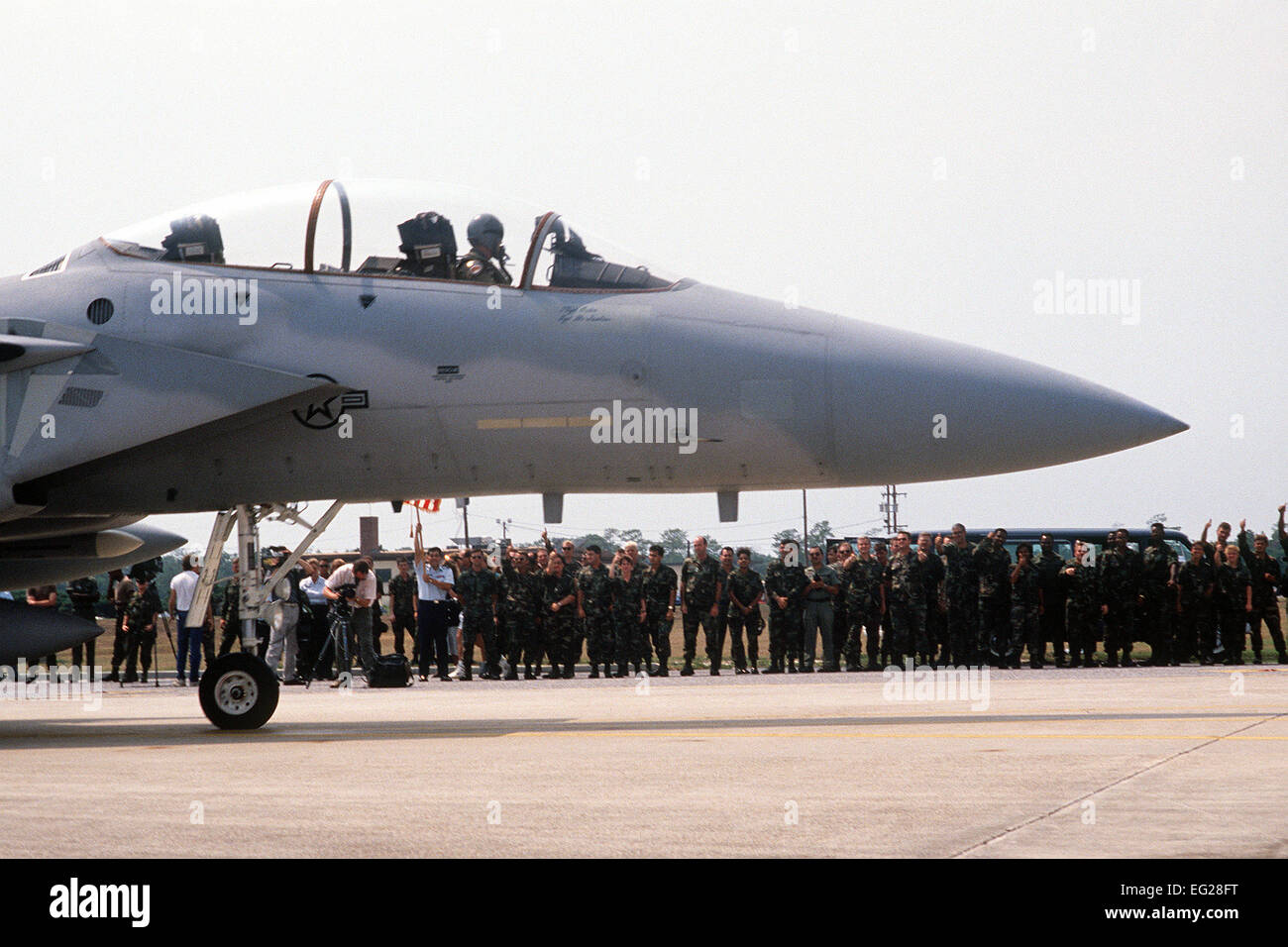 Base personnel stand by as a 58th Tactical Fighter Squadron F-15D Eagle ...