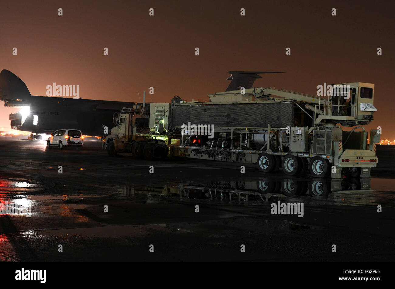 An Air Mobility Command C-5M Super Galaxy waits to be loaded with an ...