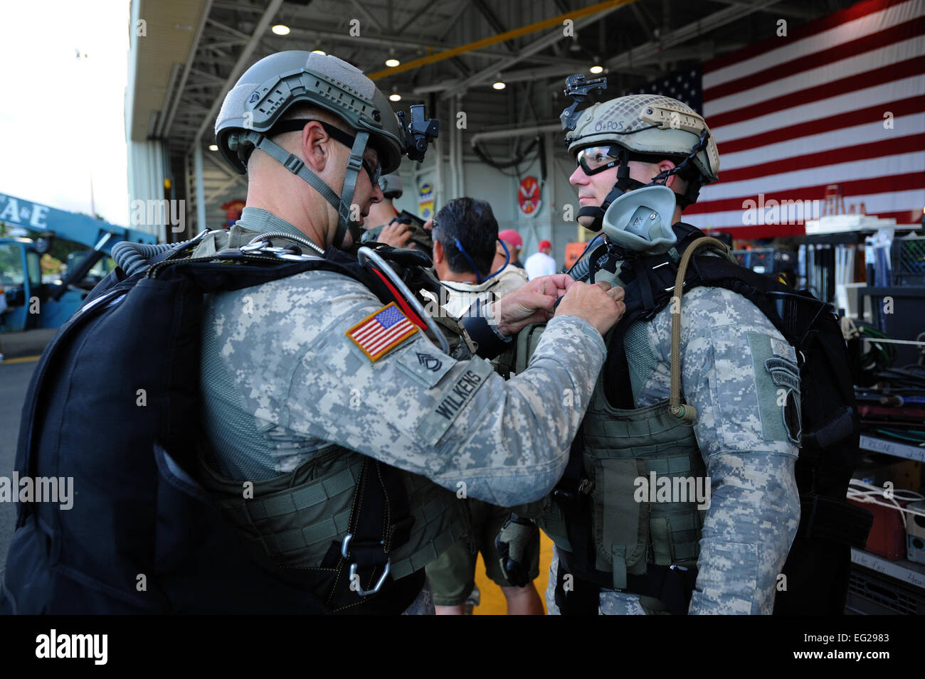 Film crew extras inspect each other’s military uniforms prior to ...