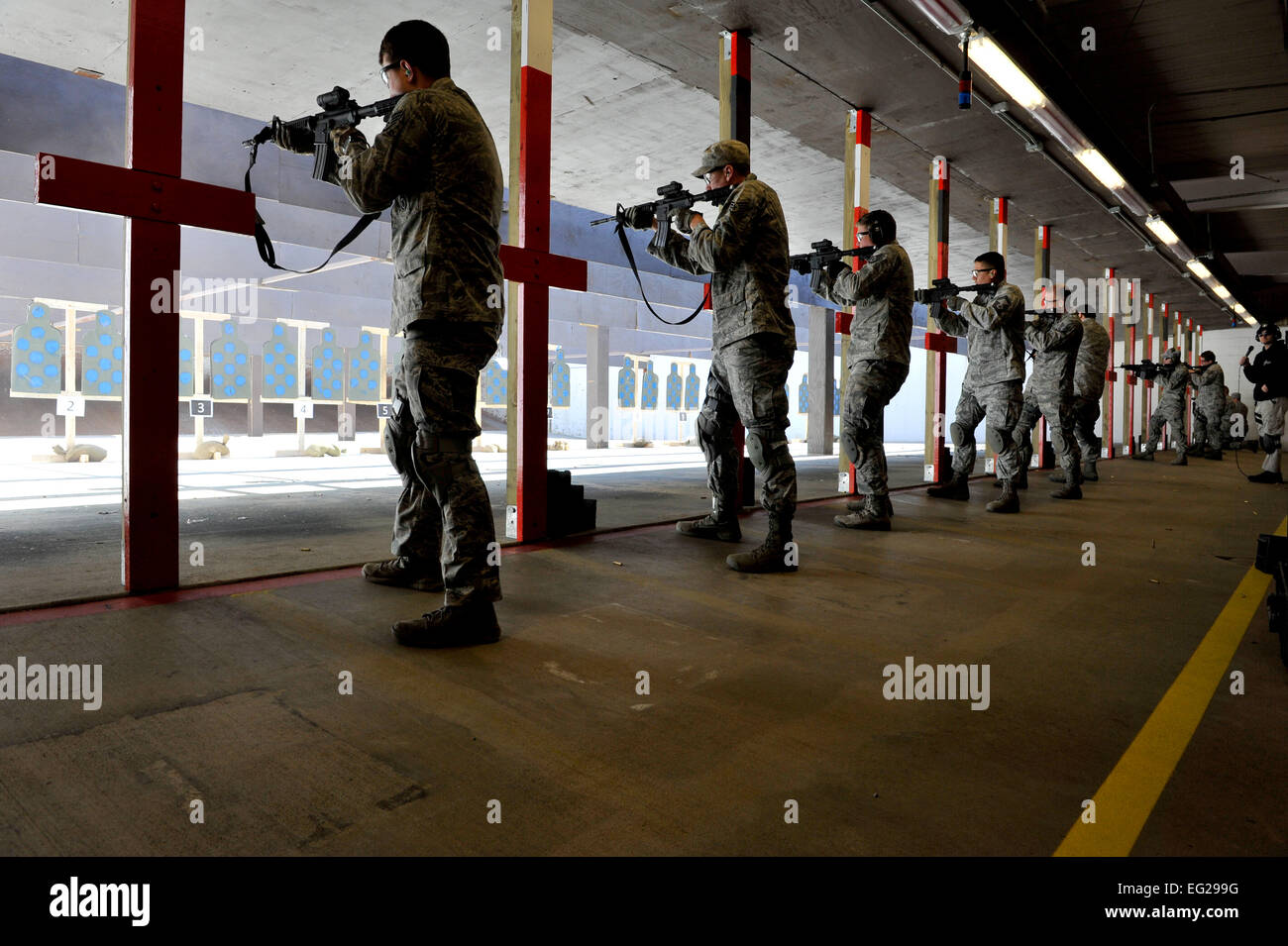 Security forces squadron trainers practice multiple stances during a ...